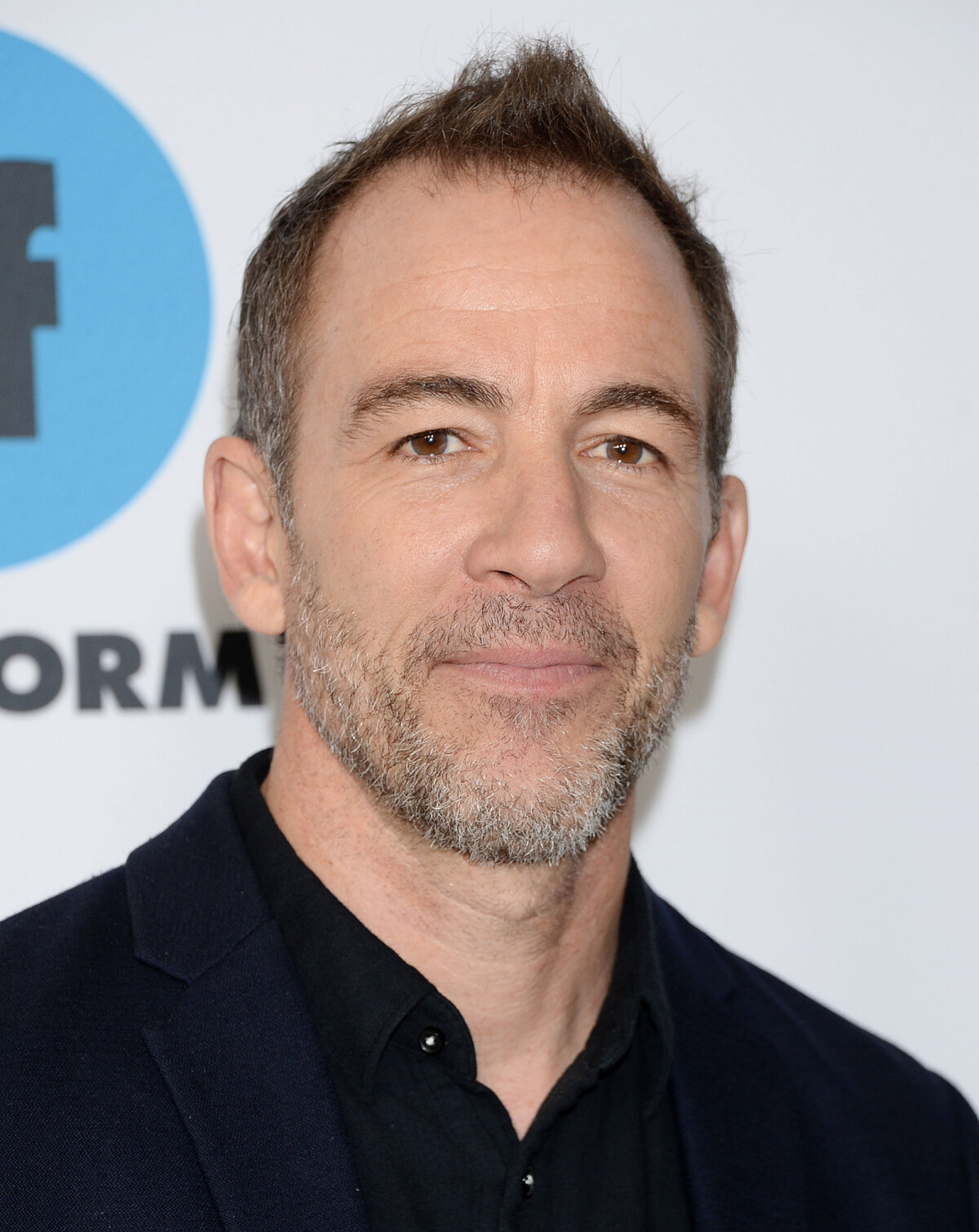 Photo : Bryan Callen lors du photocall du Press Tour des chaînes Disney ...