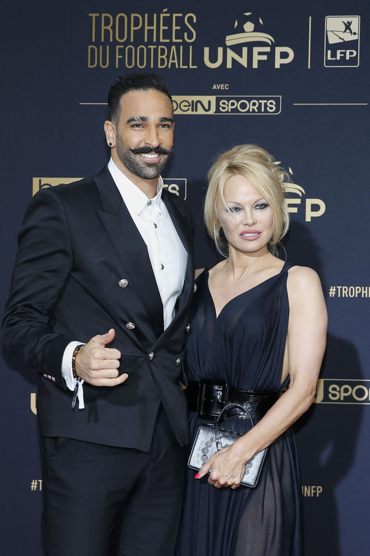 Photo : Adil Rami et sa compagne Pamela Anderson au photocall de la ...