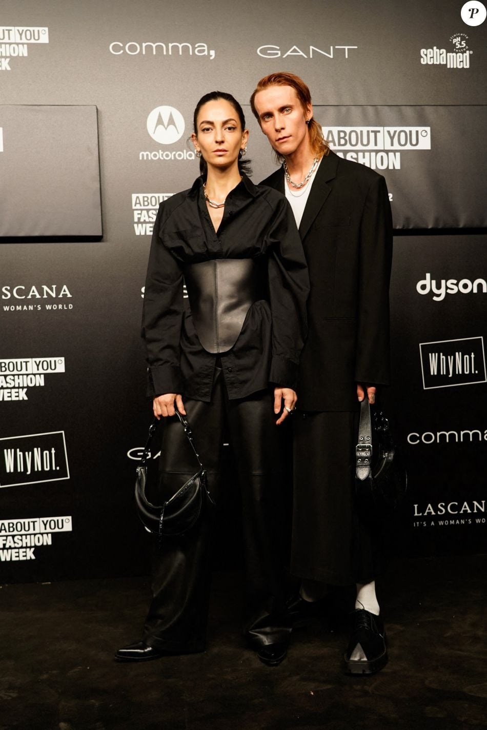 Ilenia Toma and Simon Nygard - Photocall du défilé About You lors de la ...