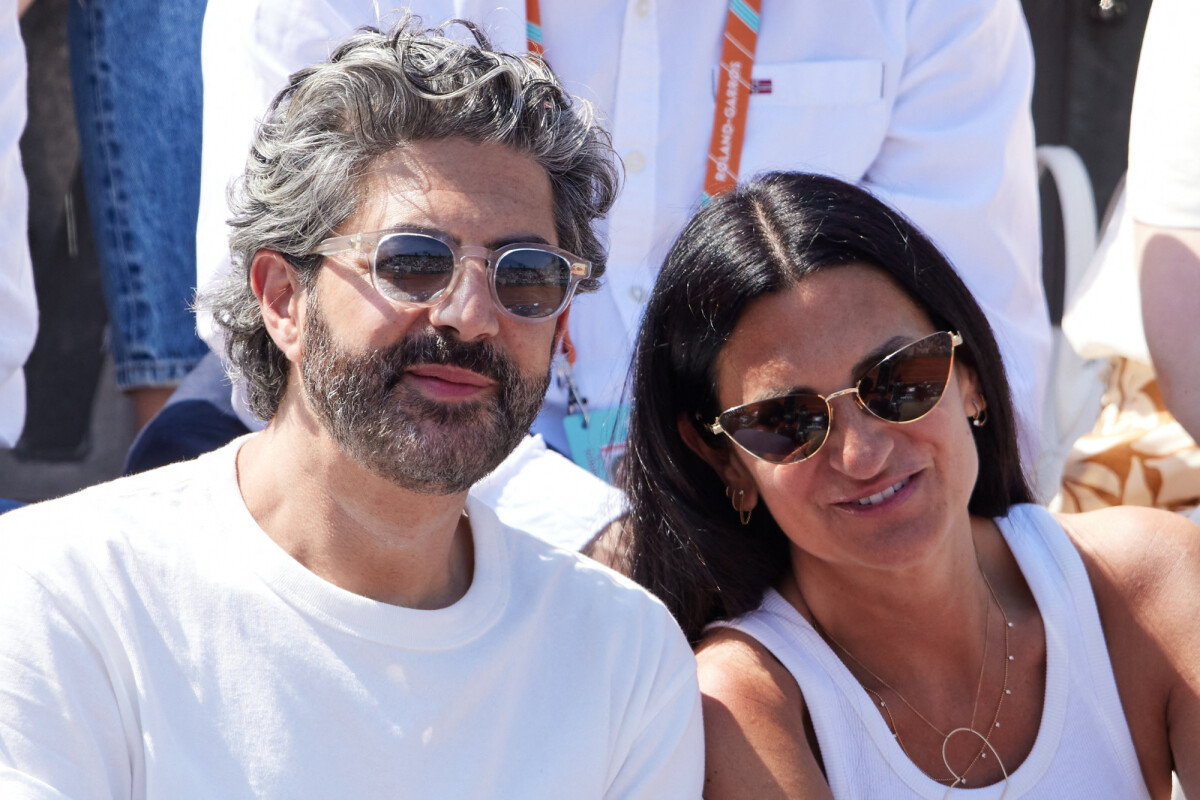 Photo : John Mamann et une amie dans les tribunes lors des ...