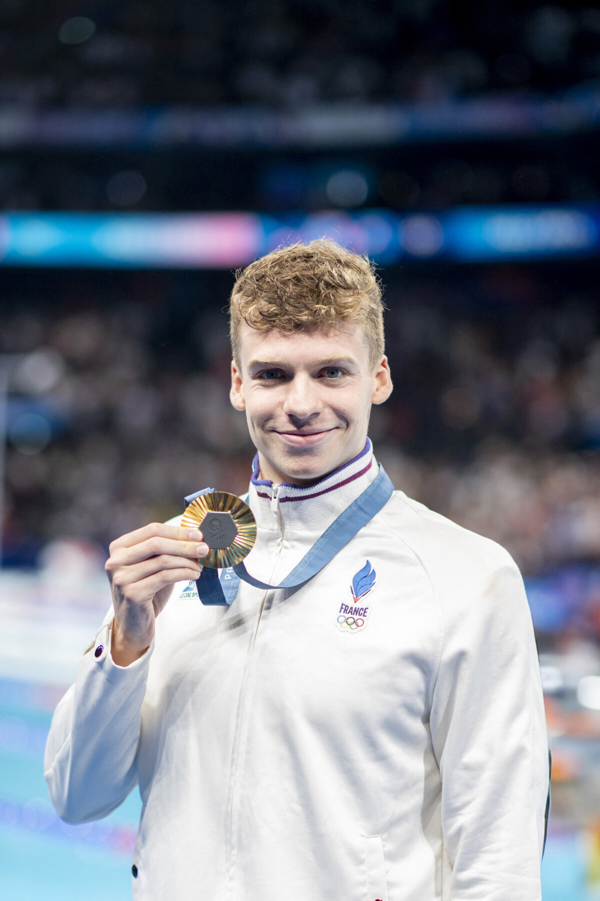 Photo : Léon Marchand a remporté la médaille d'or sur le 200 m 4 nages ...