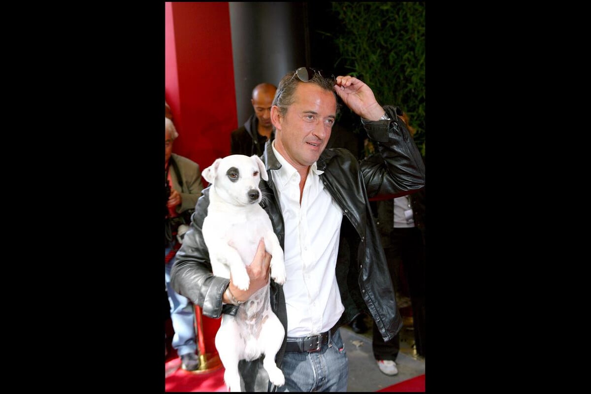 Photo : Christophe Dechavanne en août 2007 avec Adeck à Paris - Purepeople