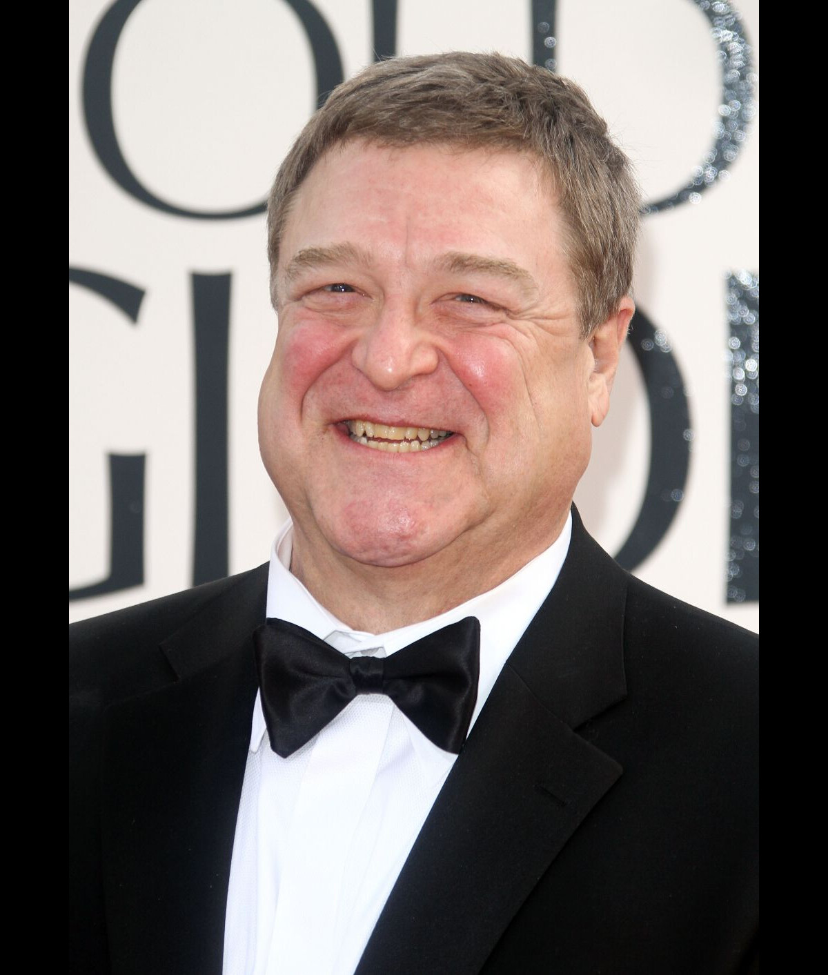 Photo : John Goodman tout sourire avant le triomphe d'Argo aux Golden ...