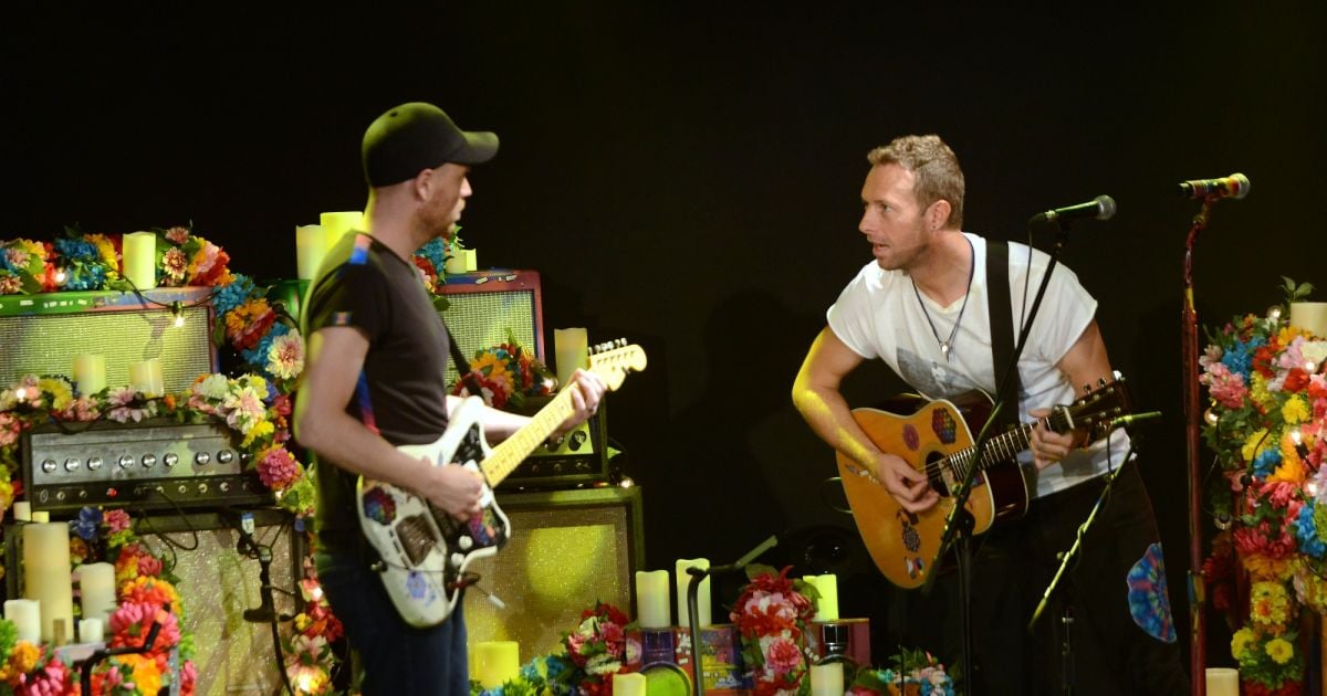 Jonny Buckland (Coldplay), Chris Martin (Coldplay) sur le plateau de l ...