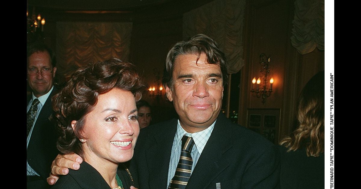 Dominique et Bernard Tapie lors de la première du film Hommes, femmes, mode d'emploi, à Paris le ...