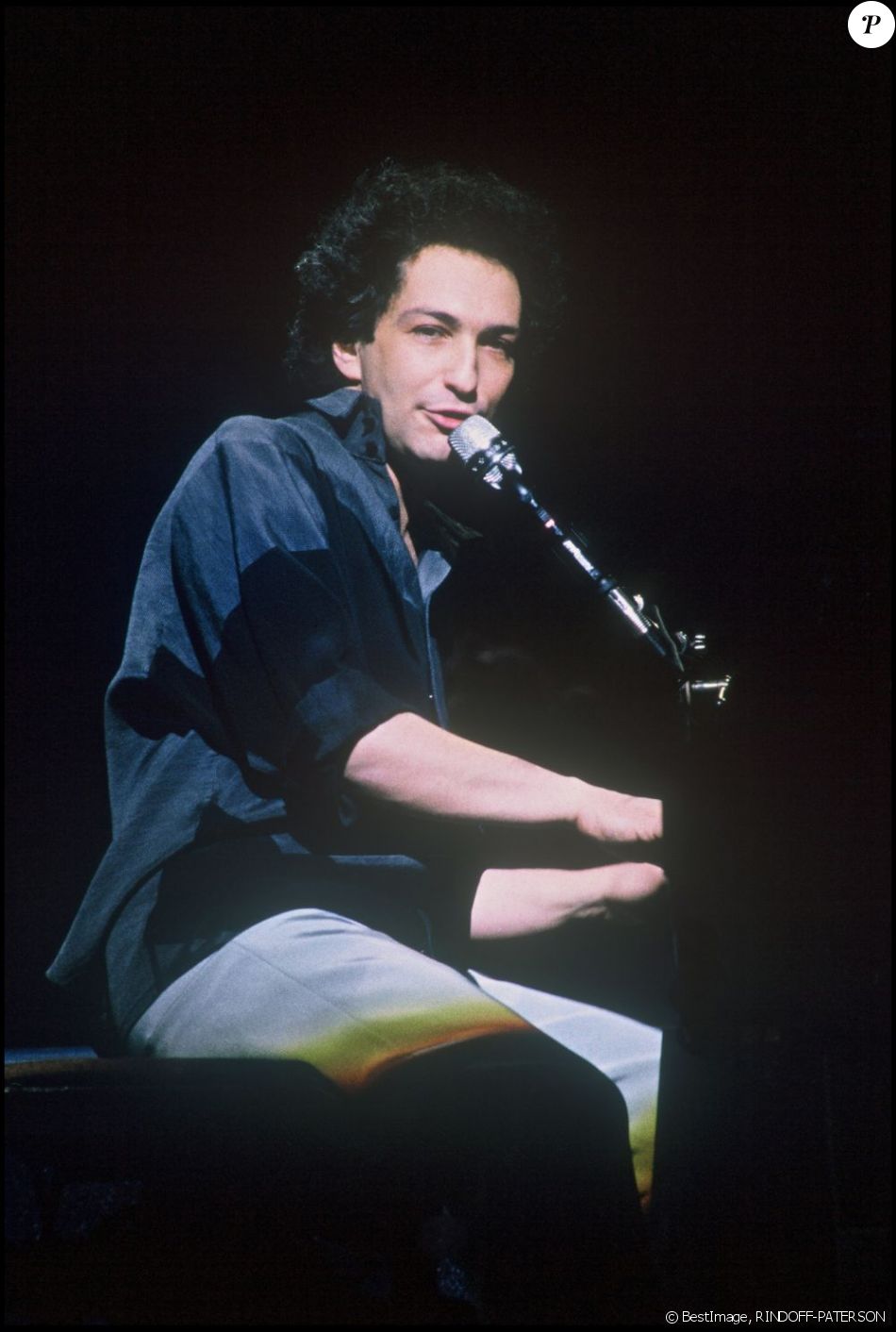 Michel Berger en concert à Paris, en 1986. - Purepeople