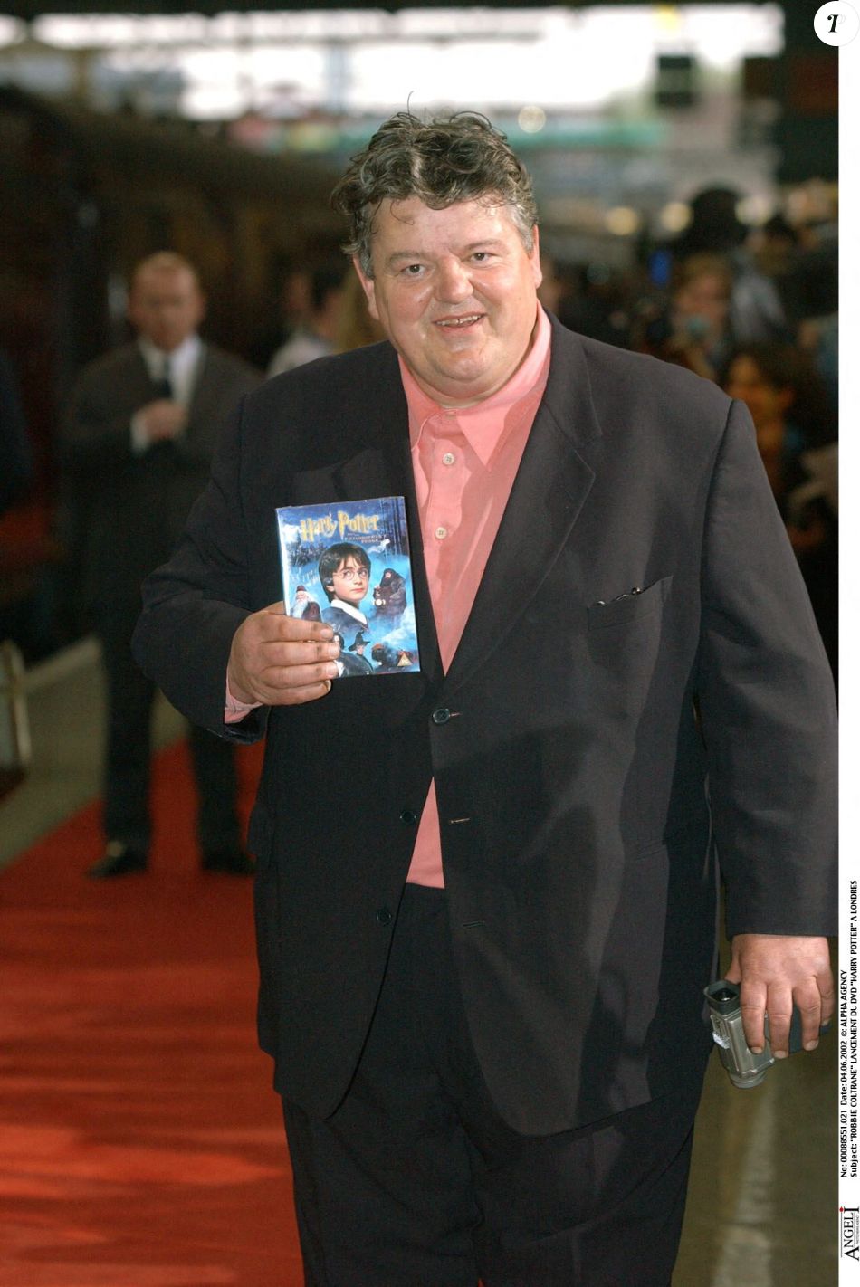 Robbie Coltrane lors du lanchement du DVD de Harry Potter en 2003 ...