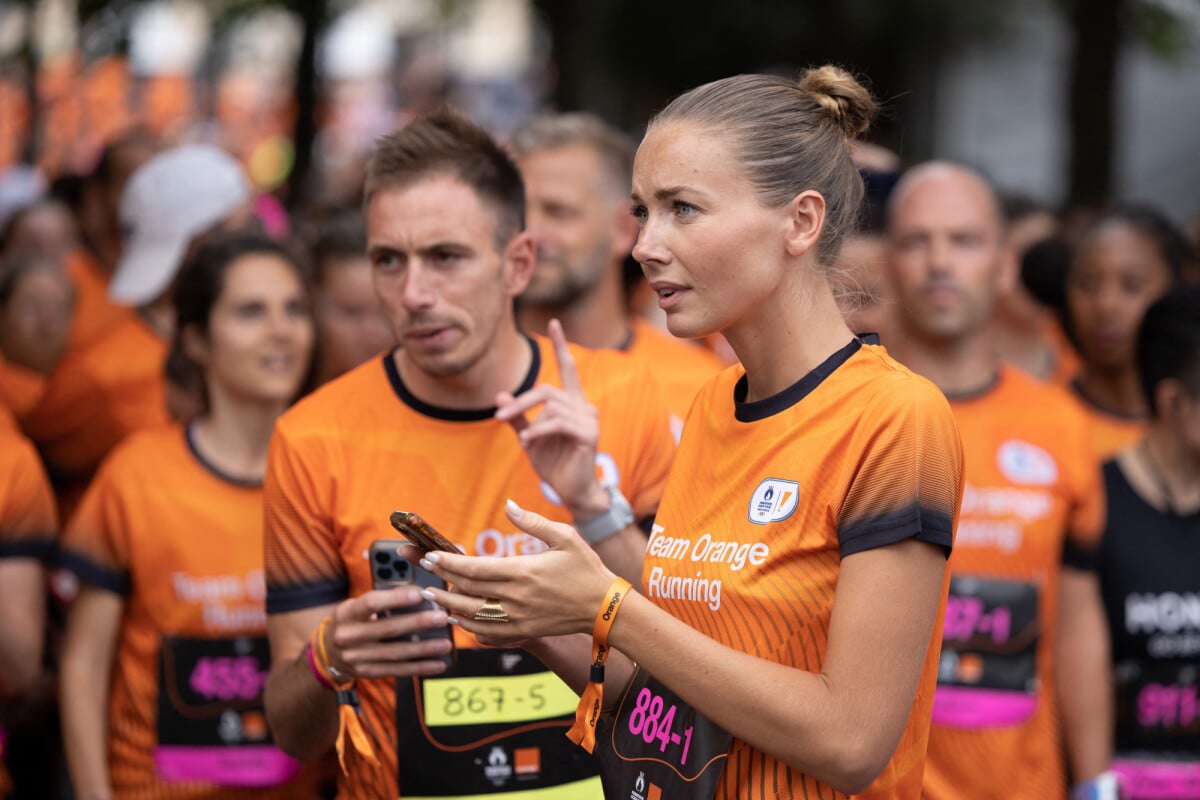 Photo : Amandine Petit (Miss France 2021) lors du marathon Orange Night Run, une boucle de 5,274 ...