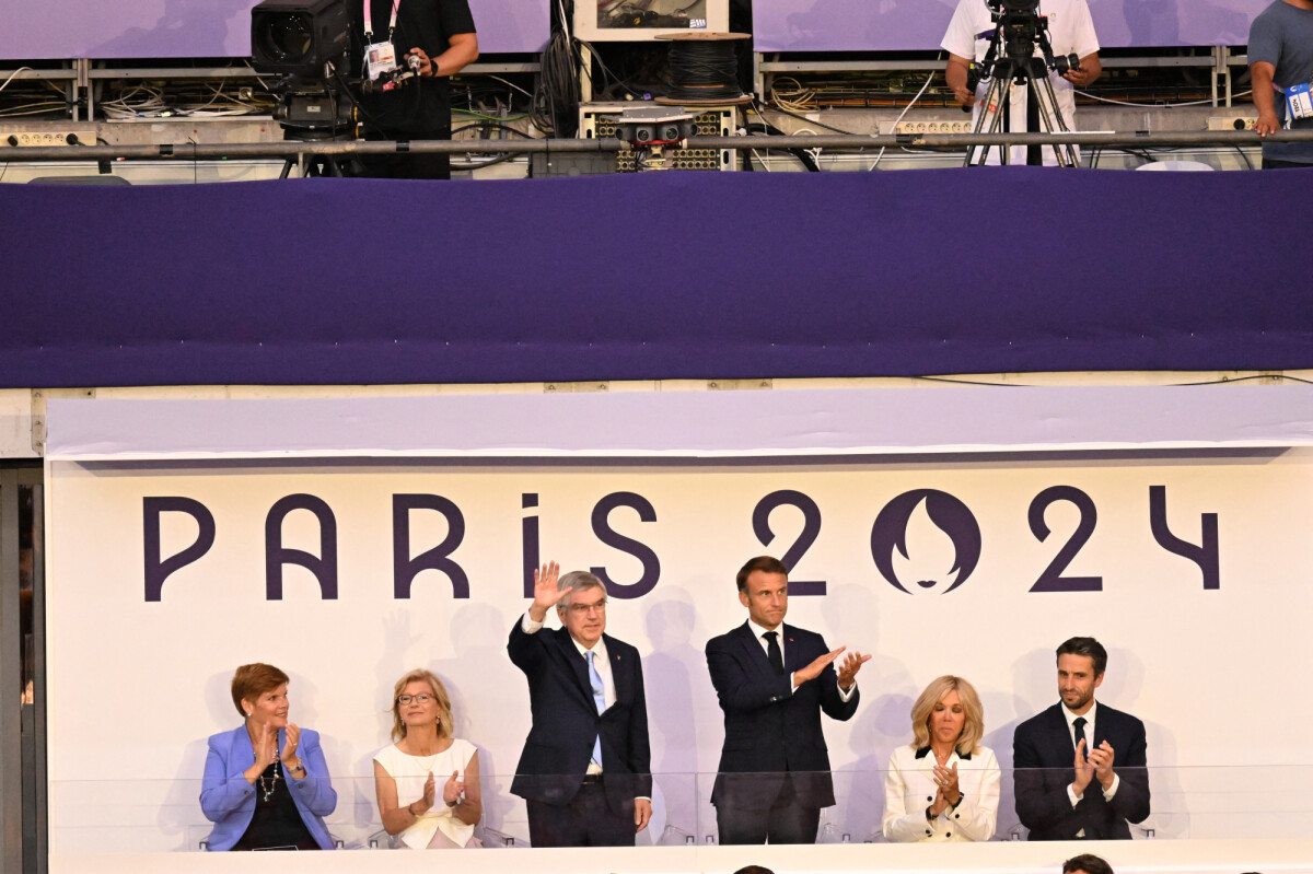 Photo : Thomas Bach, président du CIO, Le président de la République ...