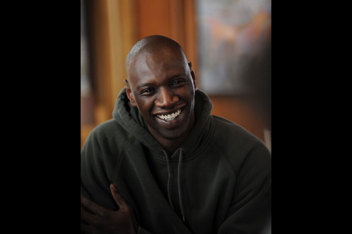 Photo : Omar Sy dans Intouchables. - Purepeople