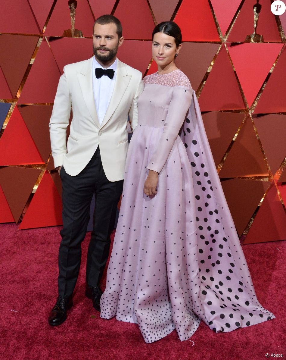 Jamie Dornan et Amelia Warner lors de la cérémonie des Oscars le 26 ...