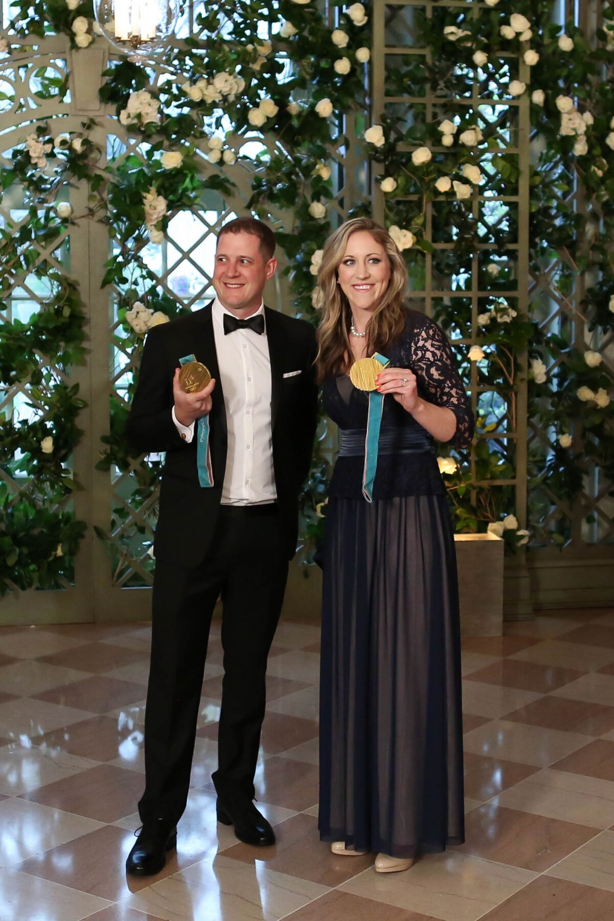 Photo : John Shuster (Curleur) et Meghan Duggan (joueuse de hockey sur ...