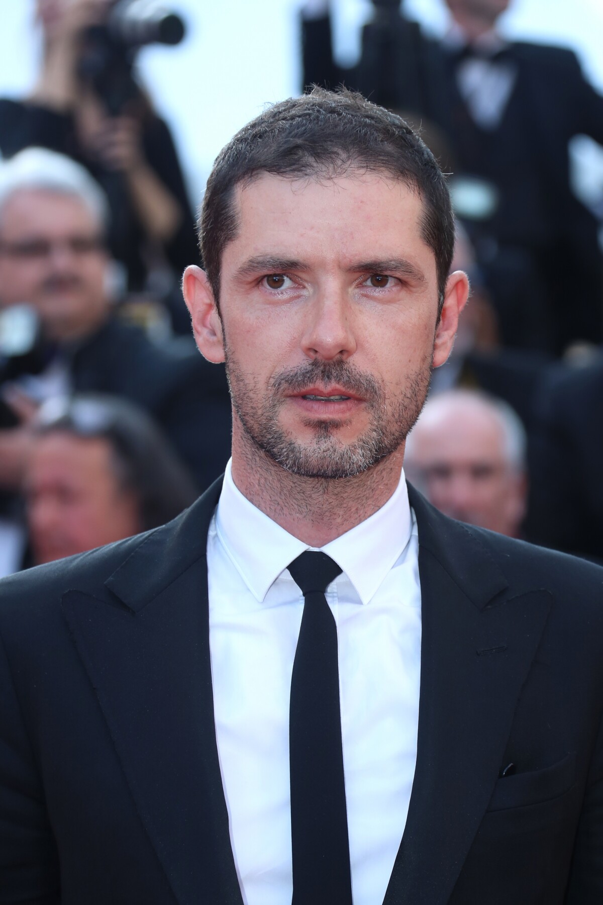 Photo : Melvil Poupaud - Montée des marches du film "Les proies" lors du 70ème Festival ...