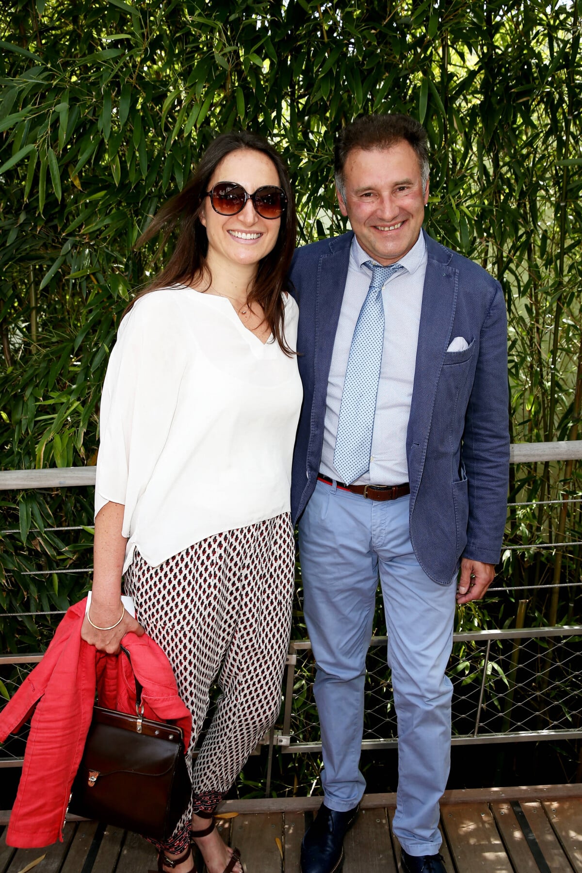 Photo : Pierre Sled et sa femme Barbara Ricuveto au village des Internationaux de Tennis de ...