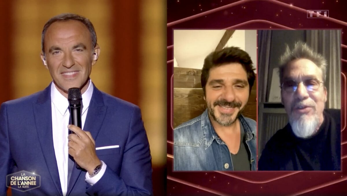Photo : Nikos Aliagas sur scène annonce en direct la chanson élue par ...