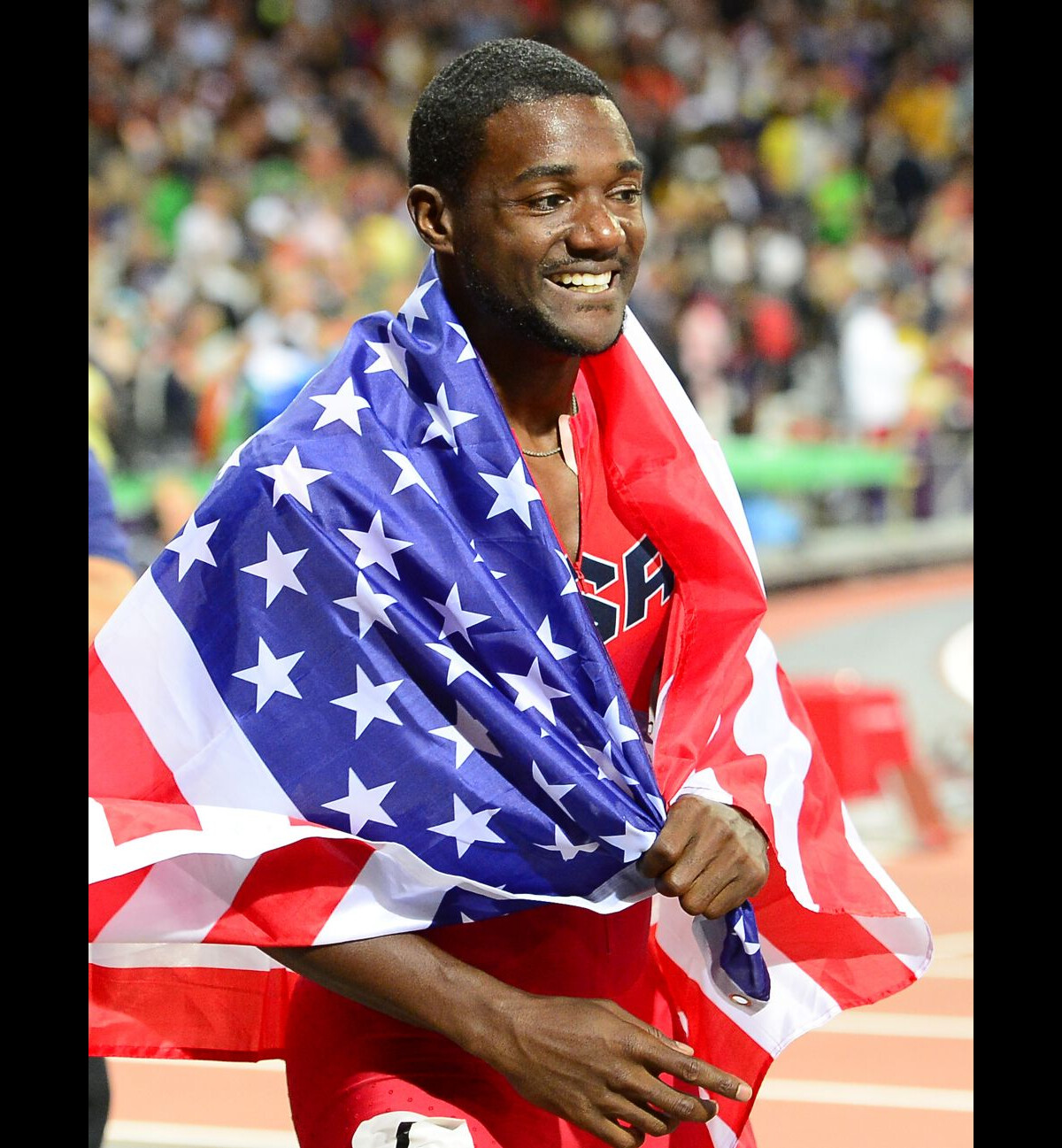 Photo : Justin Gatlin termine troisième du 100m lors des Jeux ...