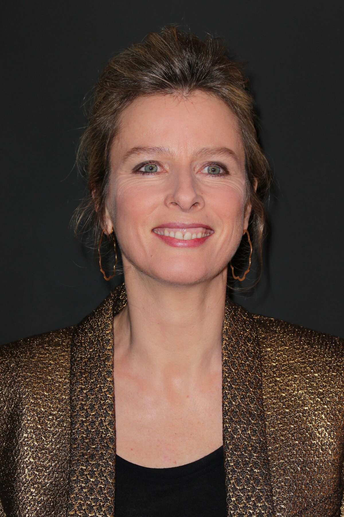 Photo : Karin Viard lors du défilé Etam à la Bourse du Commerce Paris ...