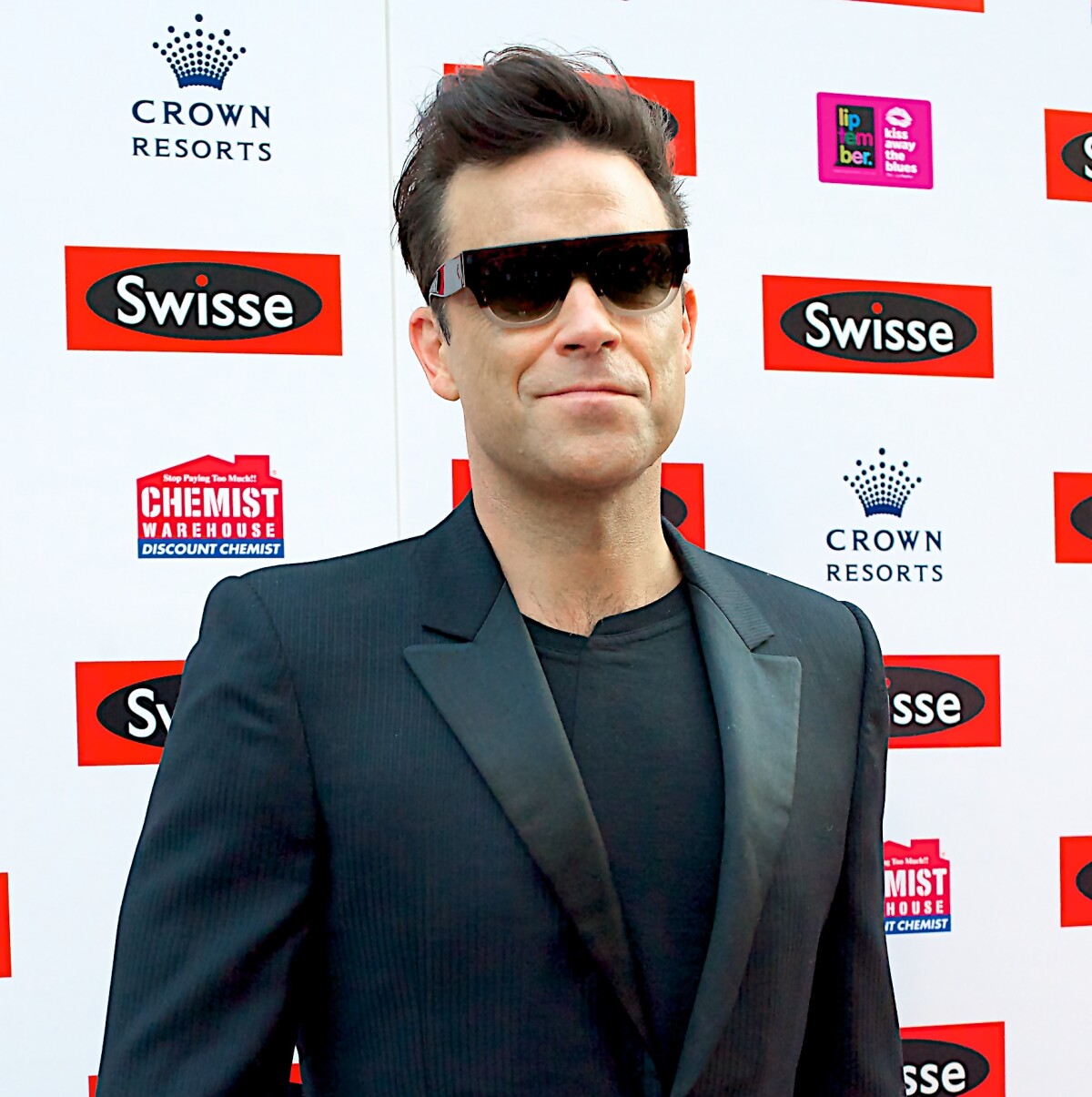 Photo : Robbie Williams pose lors du photocall avant son concert au ...