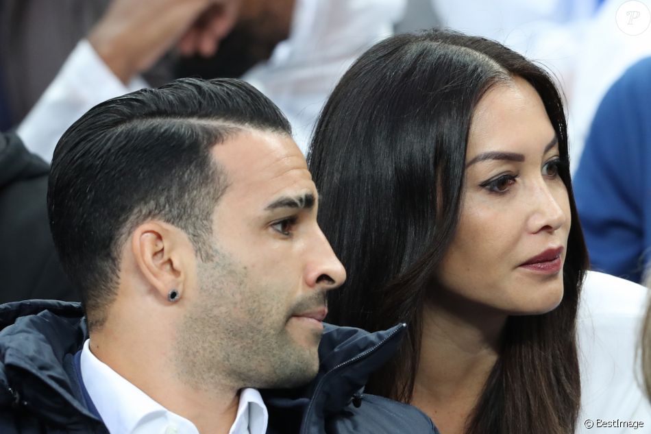 Adil Rami et sa compagne Sidonie Piémont, enceinte, lors du match du ...