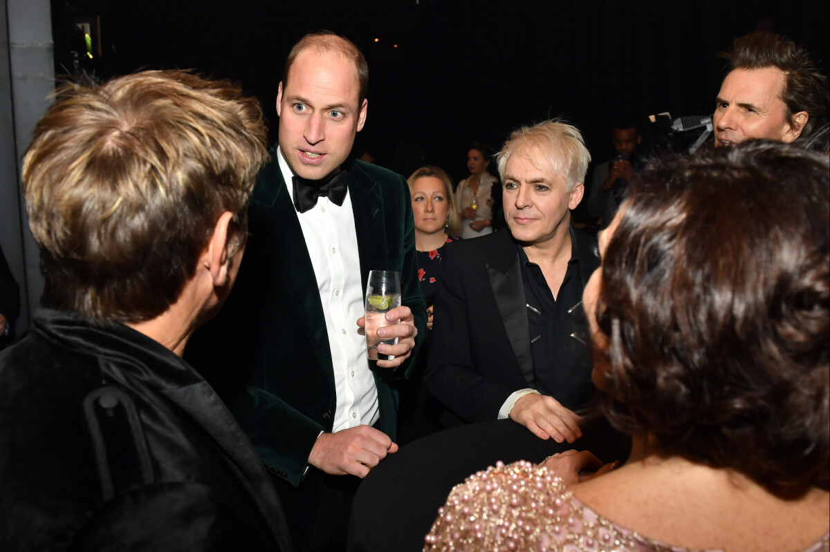Photo : Le prince William, duc de Cambridge entouré de Nick Rhodes et ...