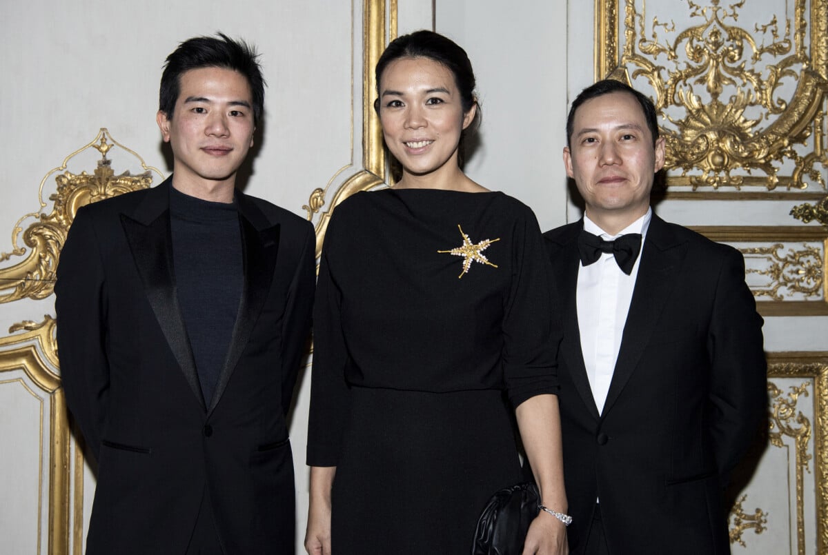 Photo : Peter Wu, Polly Chow et Albert Lin assistent à la soirée en l ...