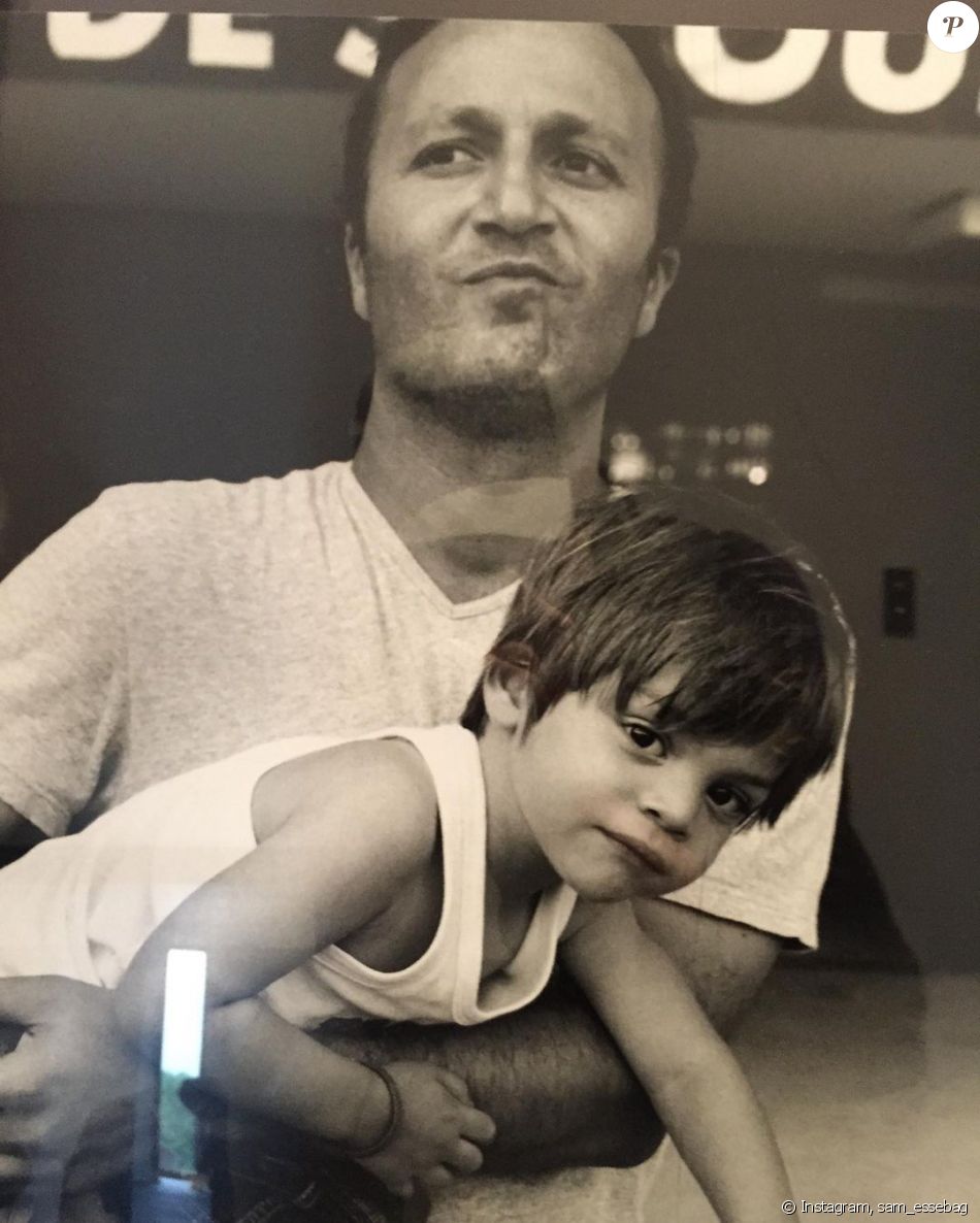 Arthur avec son fils aîné Samuel, enfant. - Purepeople