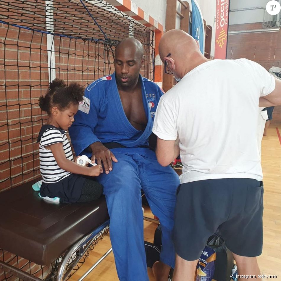 Teddy Riner et sa fille Isis sur Instagram, juillet 2021. - Purepeople