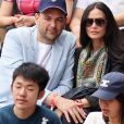 Demi Moore et son compagnon Daniel Humm dans les tribunes lors des ...