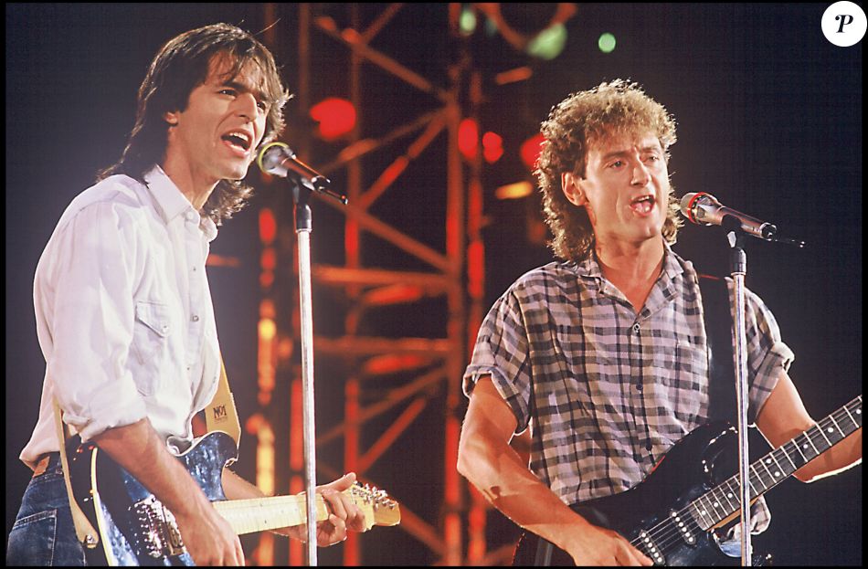 Jean-Jacques Goldman en concert en 1987 avec Michael Jones - Purepeople