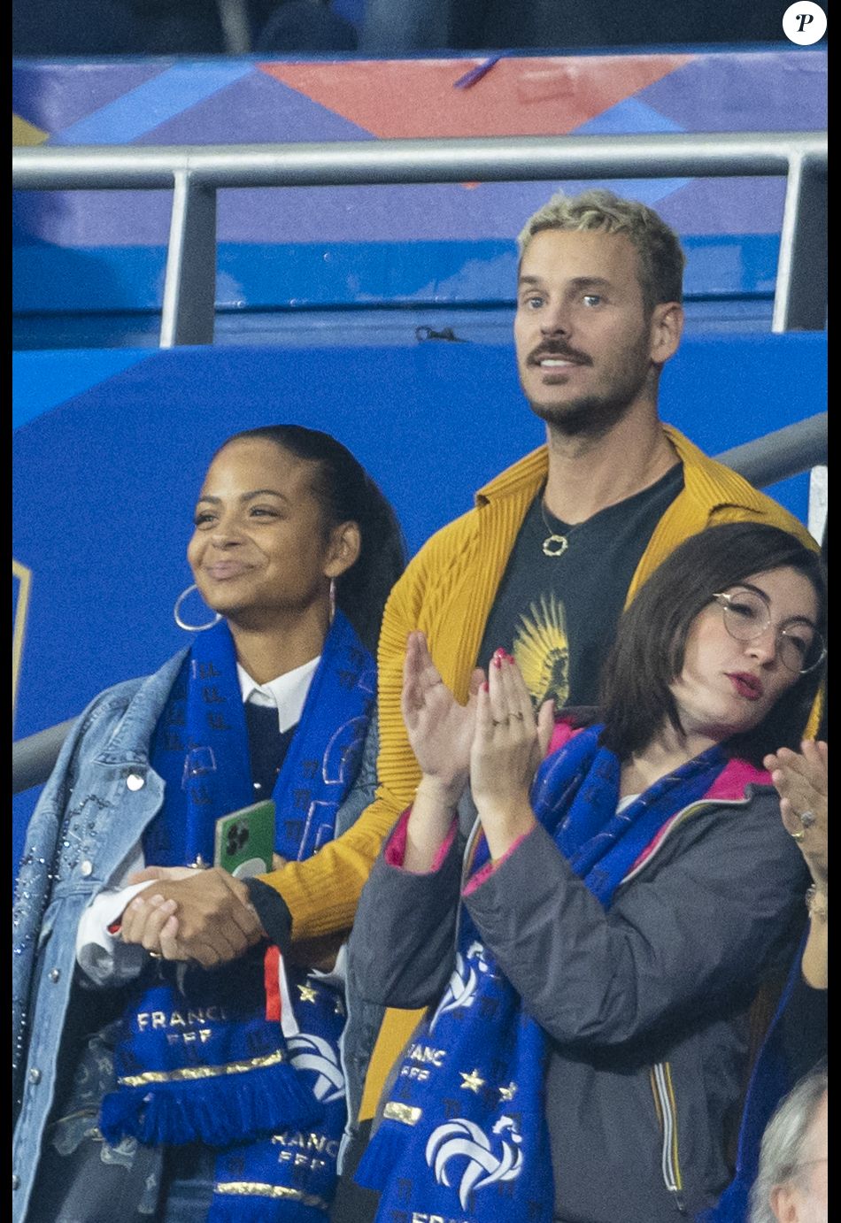 M. Pokora (Matt Pokora), sa femme Christina Milian assistent au match ...