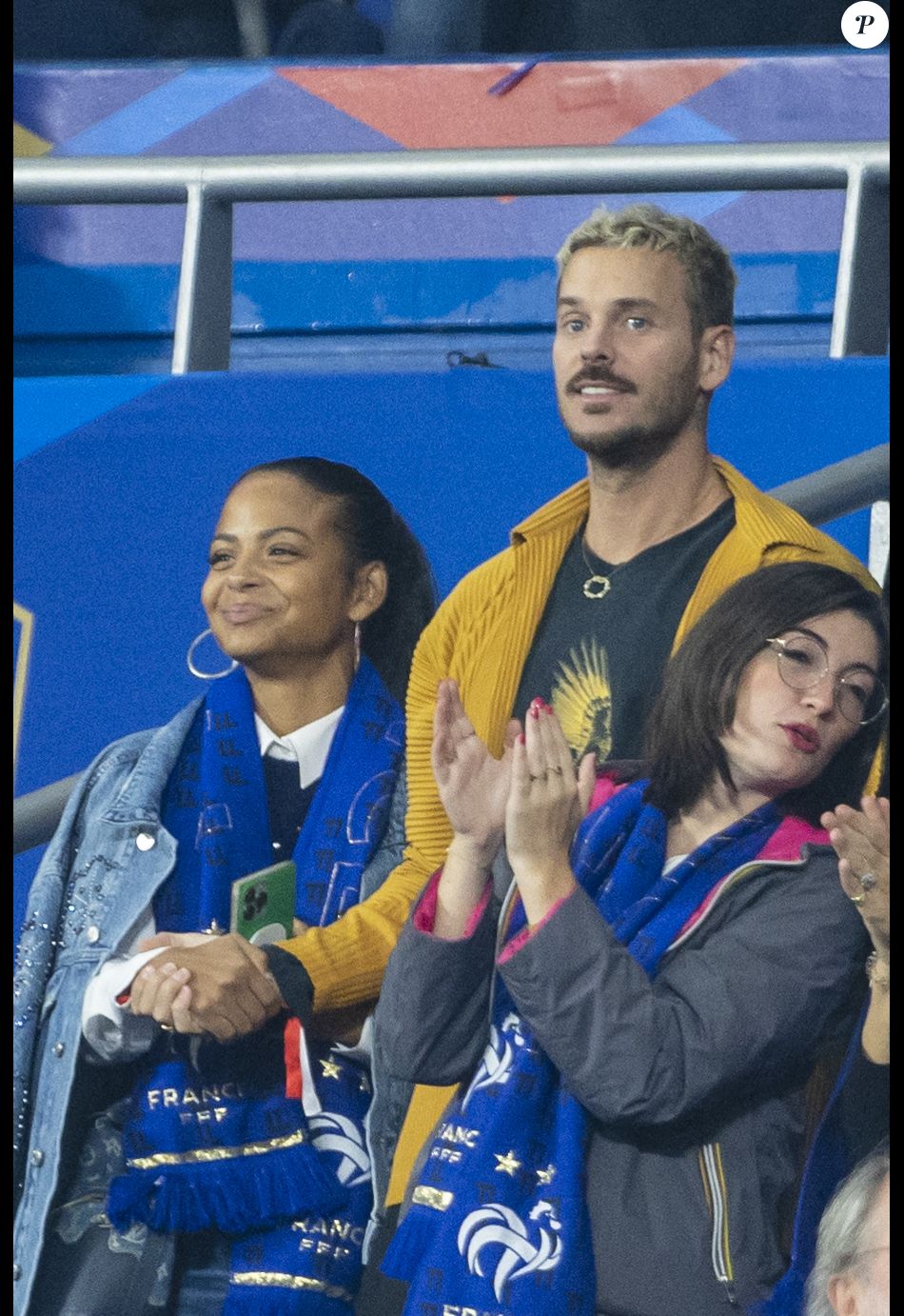 M. Pokora (Matt Pokora), sa femme Christina Milian assistent au match ...
