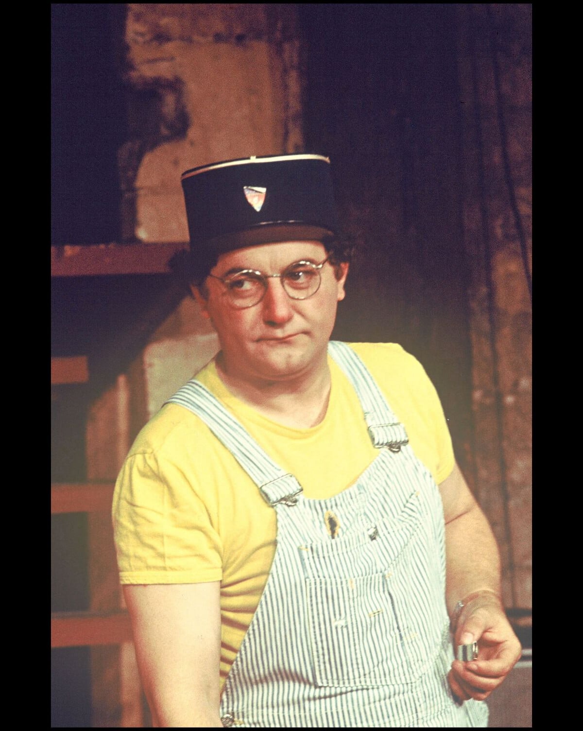 Photo : Coluche, en action. - Purepeople