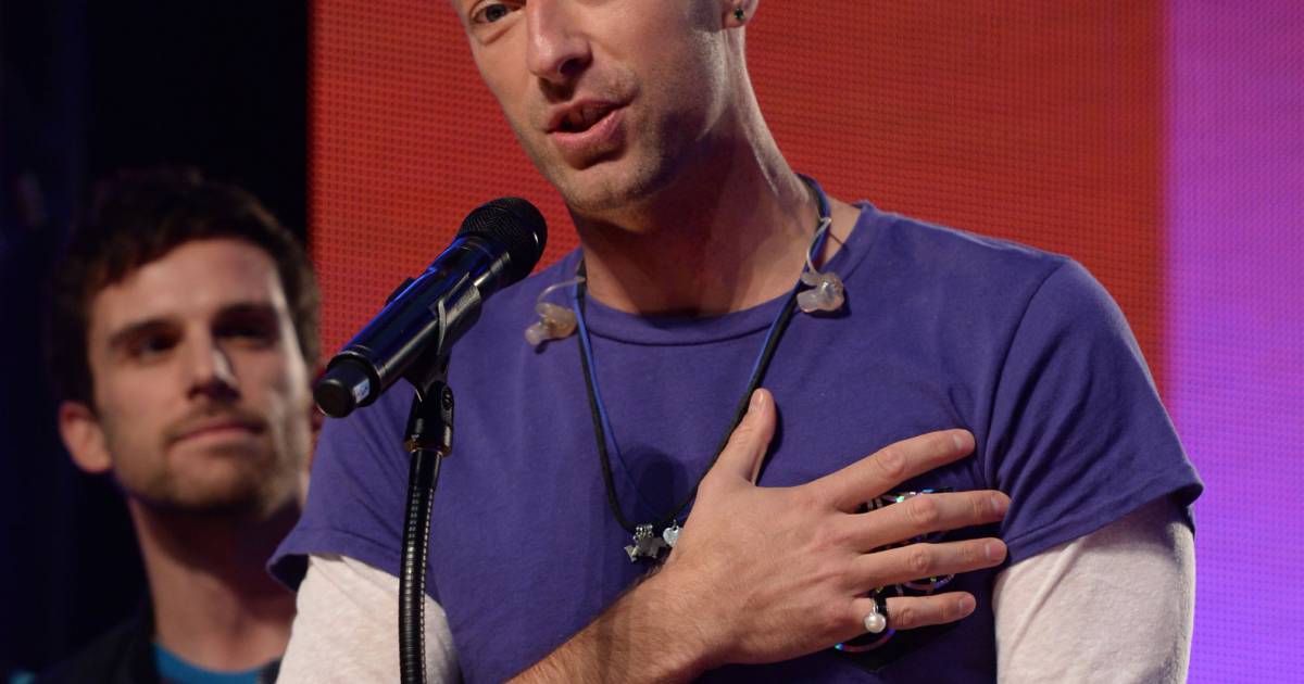 Chris Martin of Coldplay collects the Godlike Genius Award during the ...