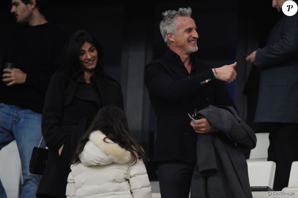 David Ginola et Maeva Denat au match de football entre l'Olympique de ...