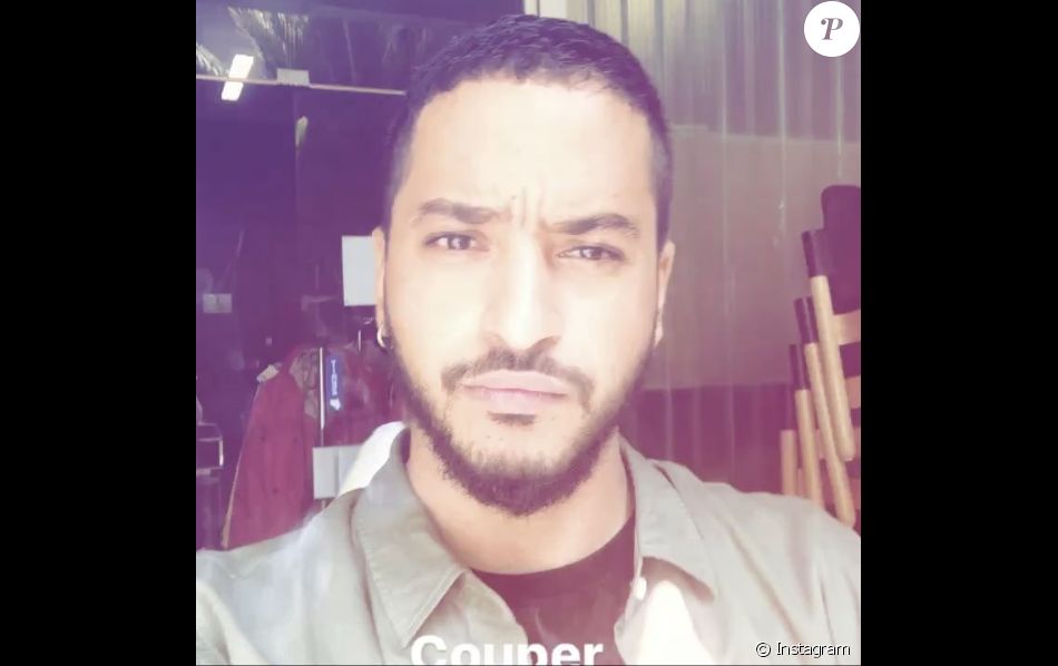Slimane dévoile sa nouvelle coupe, début juillet 2017. - Purepeople