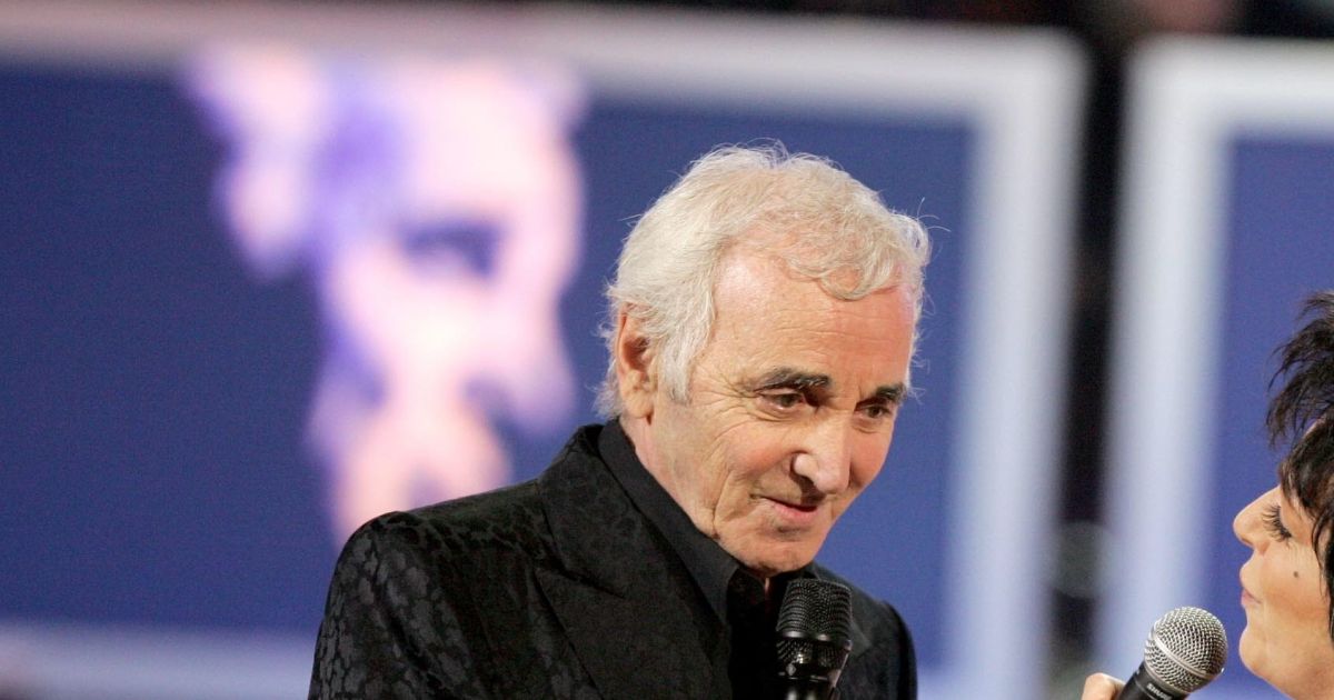 EXCLUSIF - Charles Aznavour et Liza Minelli à Paris en 2004. - Purepeople