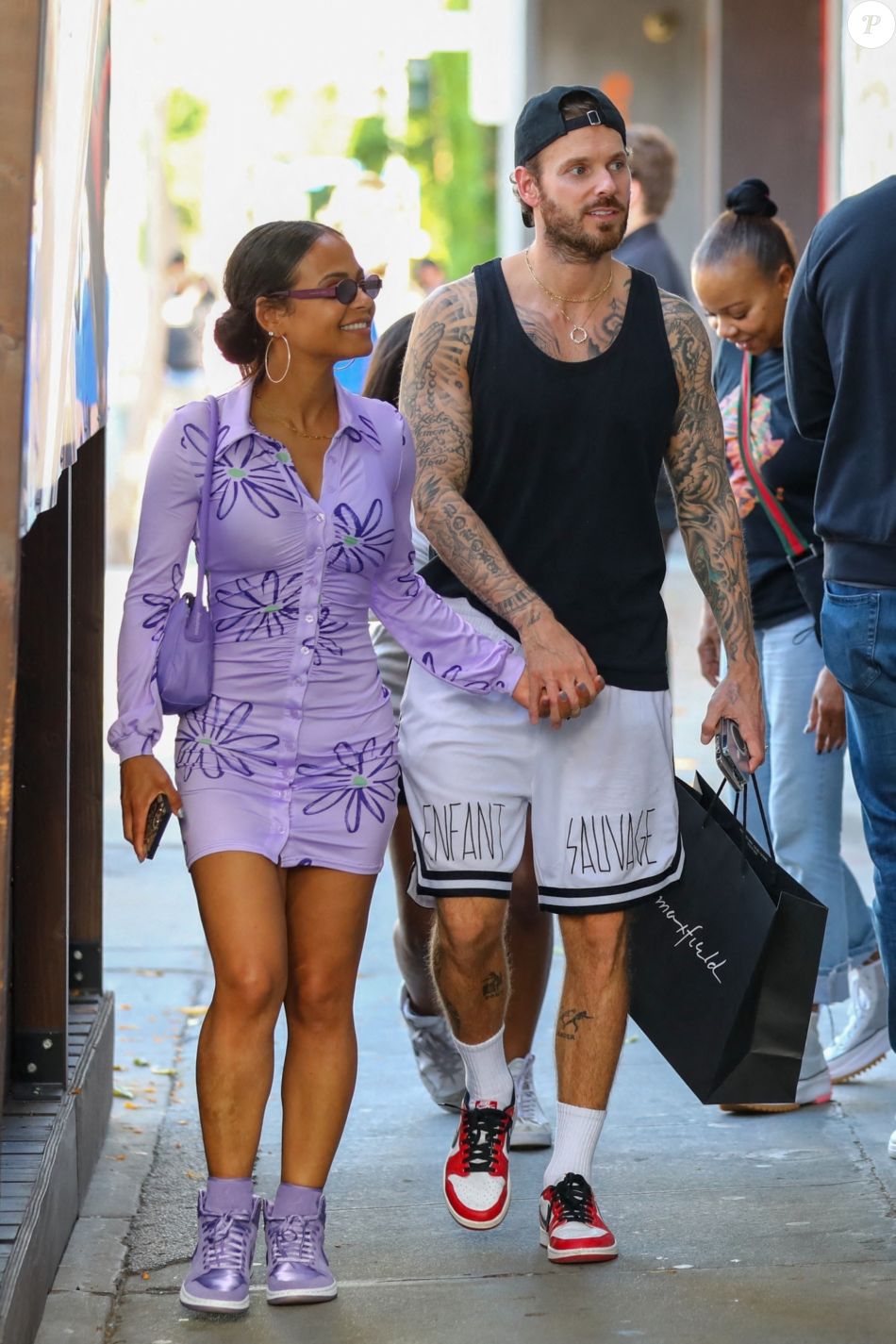 Christina Milian fait du shopping avec sa fille Violet et son mari Matt ...