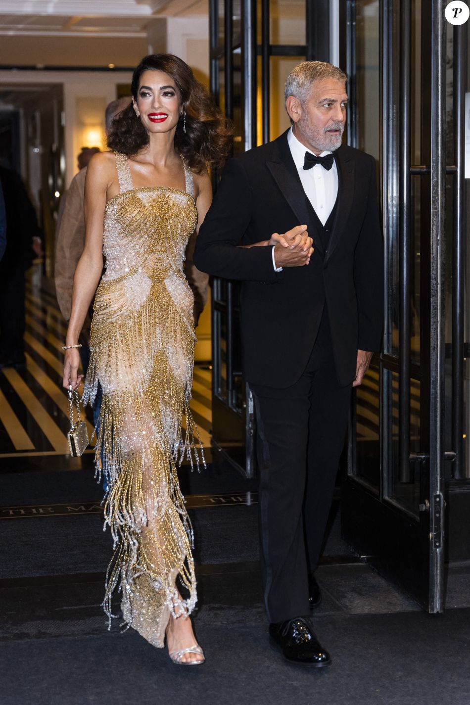 George Clooney et sa femme Amal Clooney à la sortie de leur hôtel à New ...