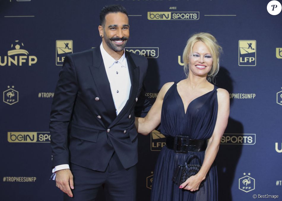 Adil Rami et sa compagne Pamela Anderson au photocall de la 28ème ...