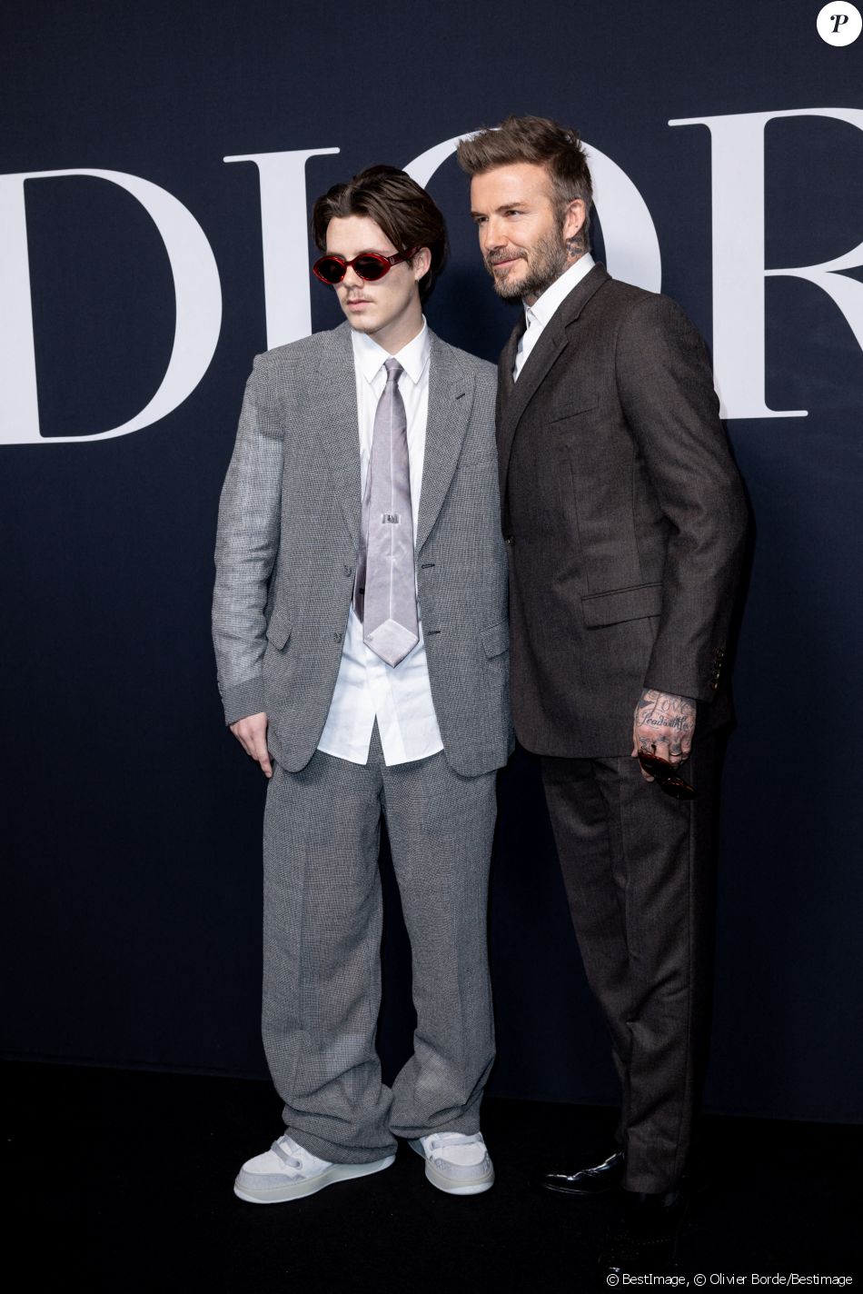 Cruz Beckham et son père David Beckham - Photocall du défilé Dior lors ...
