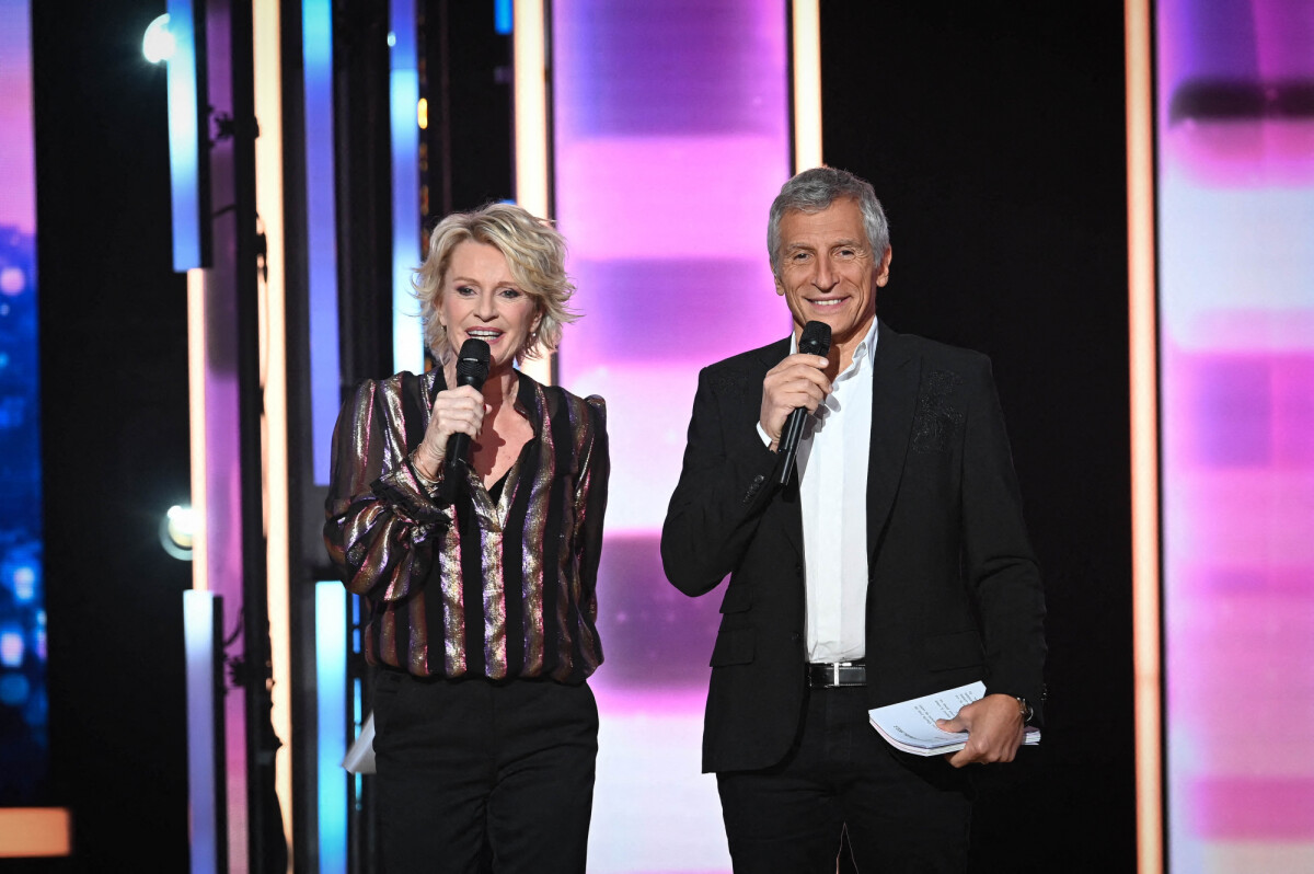 Photo : Sophie Davant, journaliste et animatrice radio et télévision et Nagui, animateur radio ...