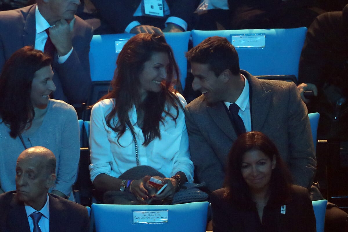 Photo : Tony Estanguet et sa femme Laetitia lors du match d'ouverture du mondial de handball, la ...