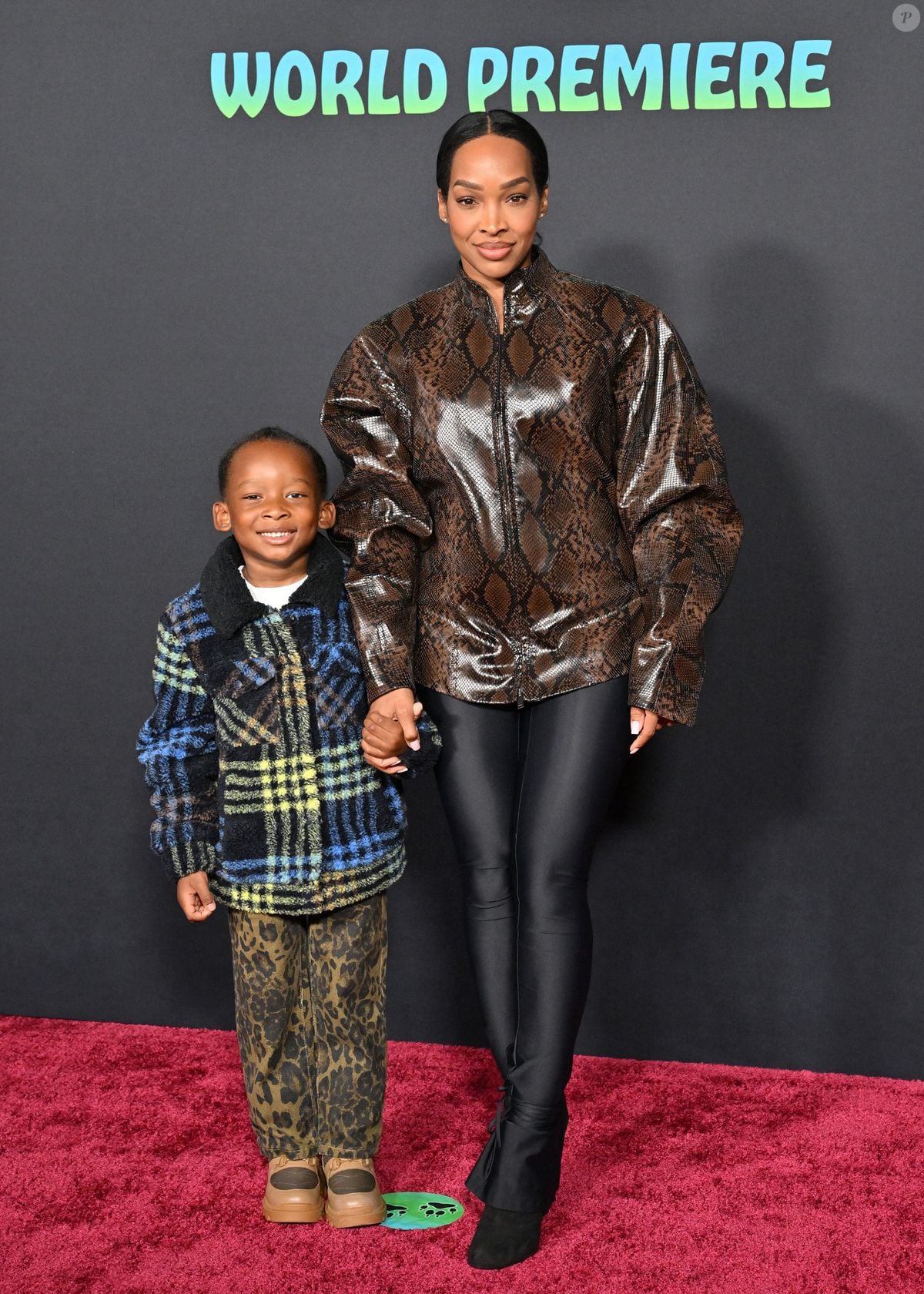Photo : Ace Flores and Malika Haqq. Avant-première de « Zootopie 2 ...