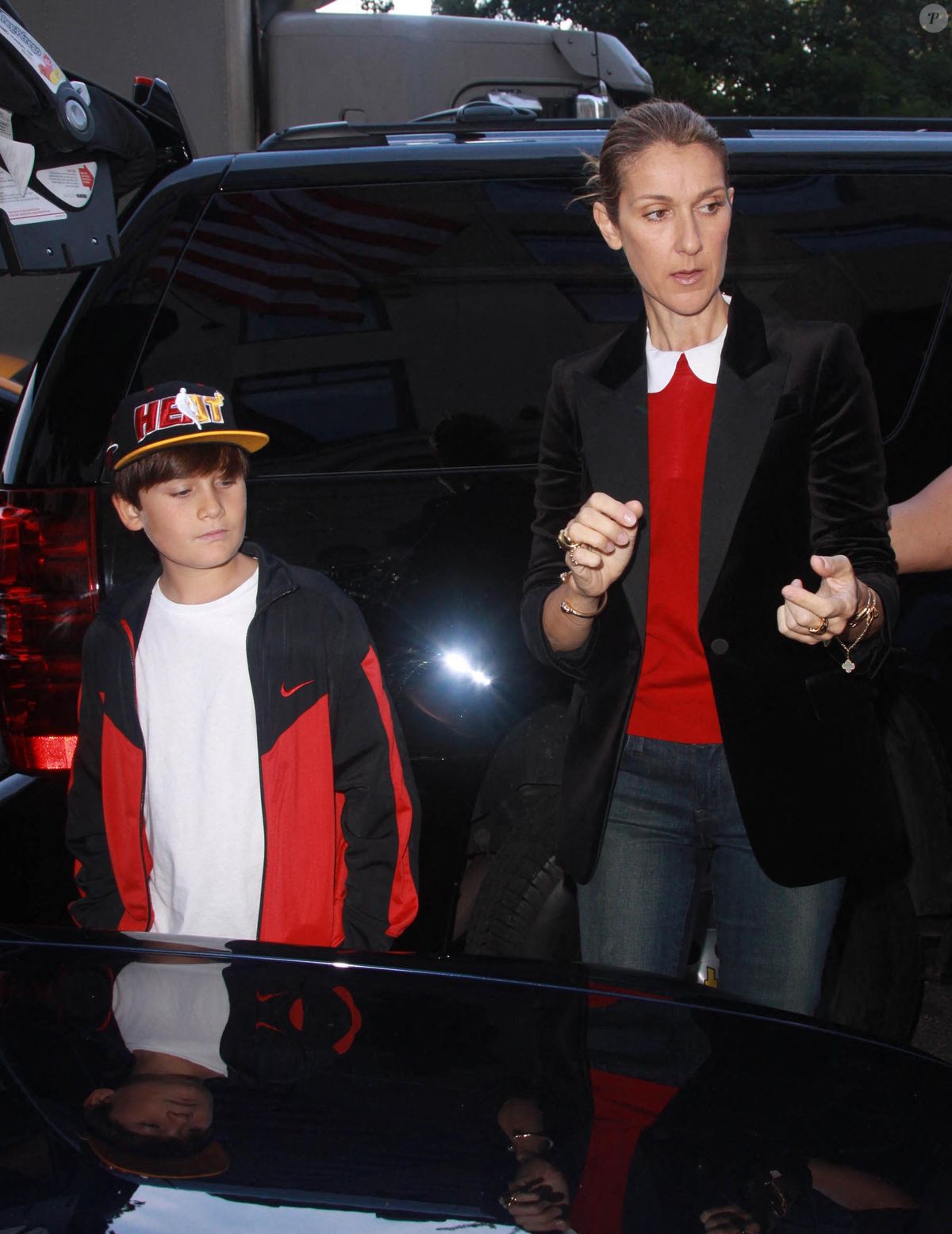 Photo : Céline Dion quittant son hôtel avec ses fils René (10 ans) et ...