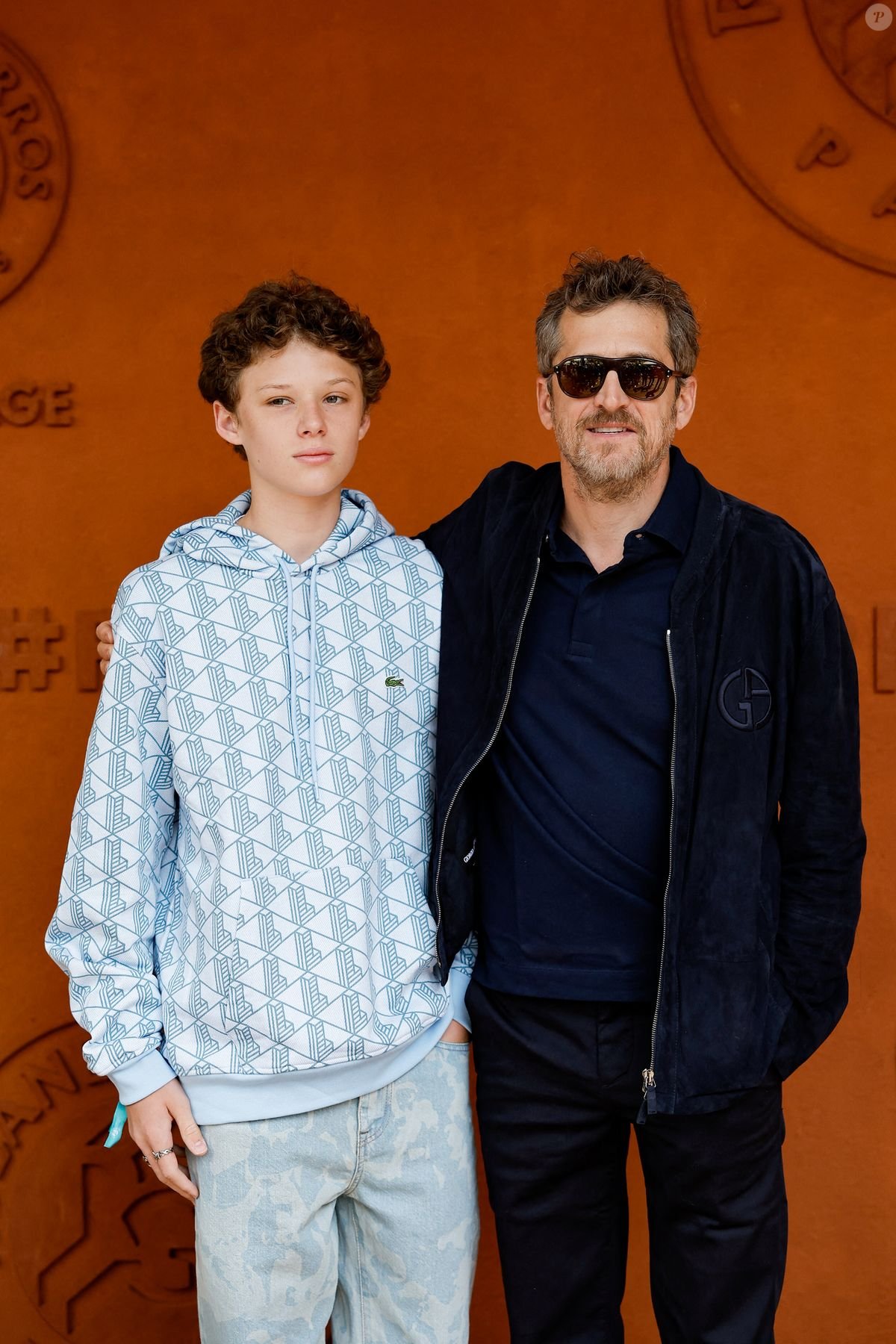 Photo : Guillaume Canet et son fils Marcel au village lors des ...
