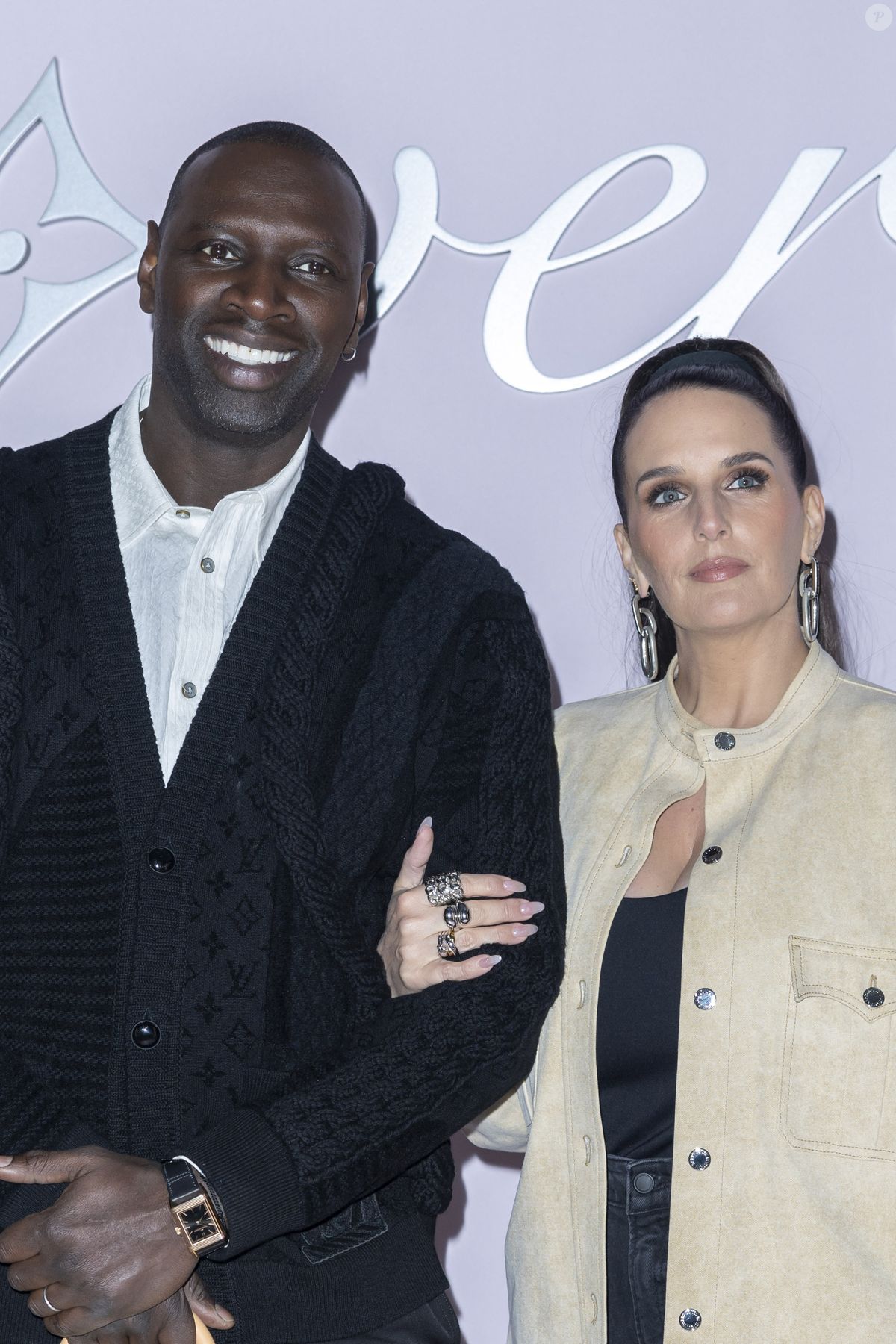 Photo : Omar Sy et Helene Sy - Photocall pour le défilé Louis Vuitton ...
