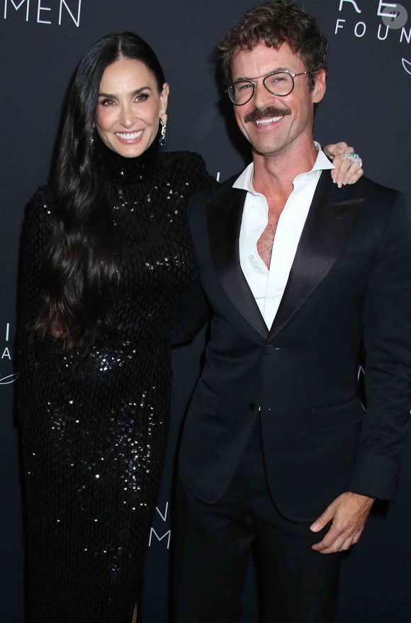 Photo : Posant à côté de Colman Domingo et de Salma Hayek Pinault (qui portait une élégante robe ...