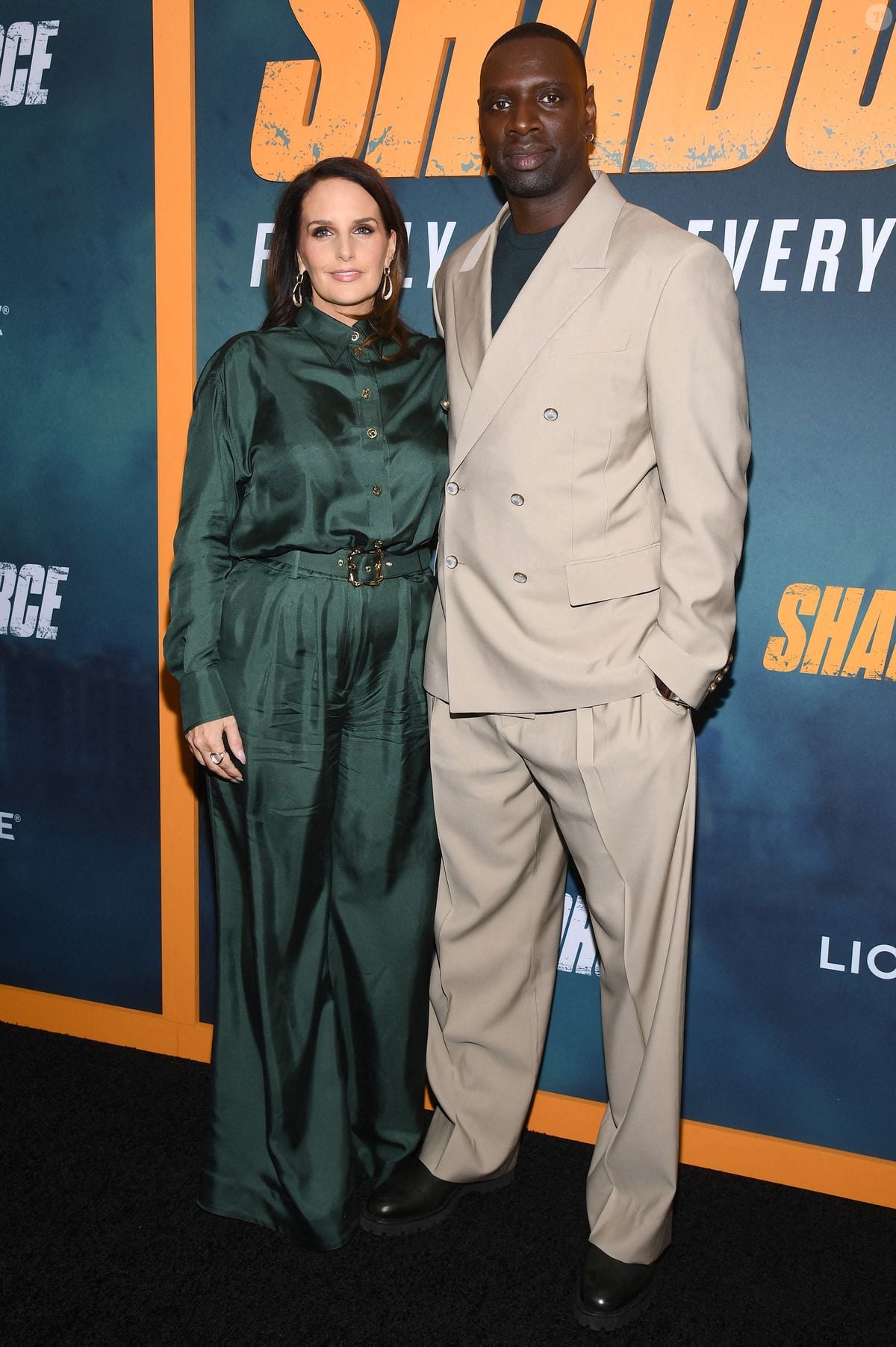 Photo : (De gauche à droite) Hélène Sy et l'acteur français Omar Sy ...