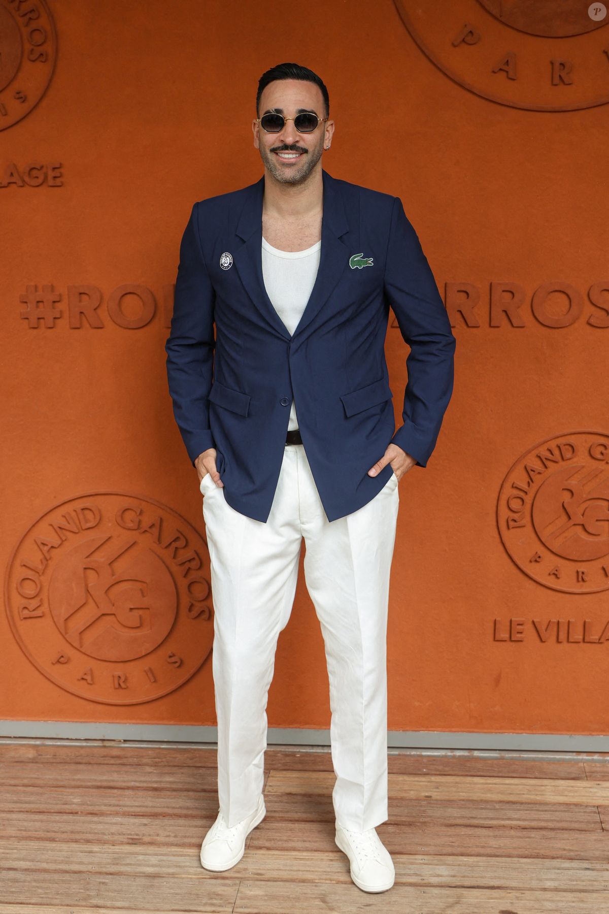 Photo : Adil Rami en tribune lors des Internationaux de France 2025 à ...