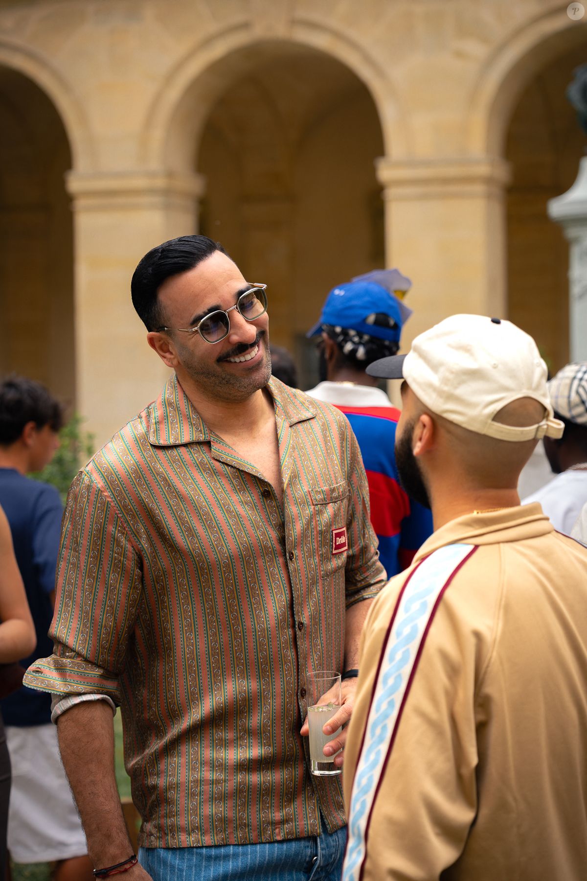 Photo : Adil Rami et Oli (Olivio Ordoñez) au Front Row du défilé Drôle ...